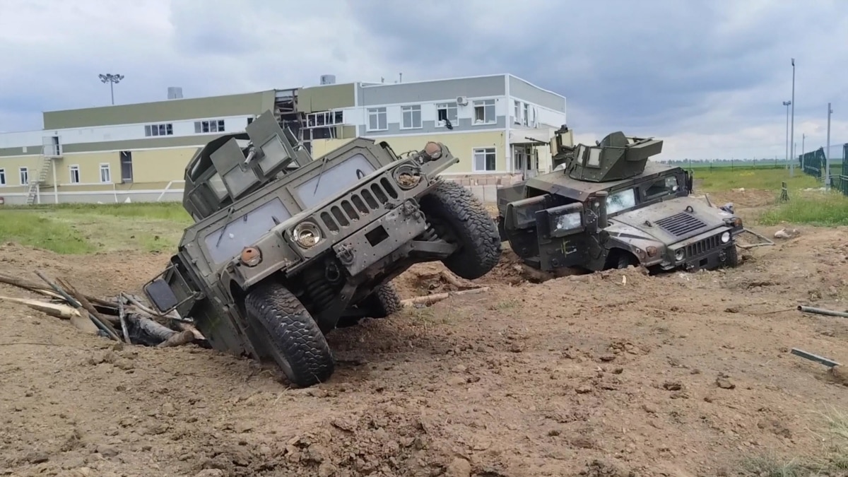 Humvees, Wreckage After 'Cross-Border Raid' Into Russia