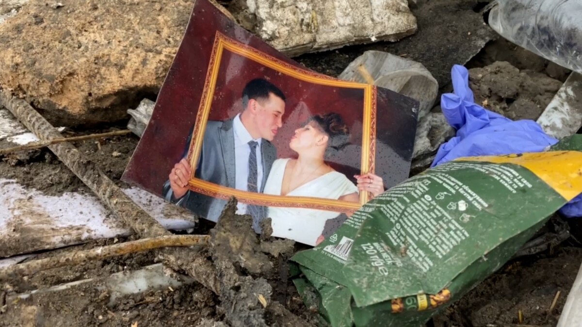 Ukrainian Rescuers Search Debris After Missile Attack