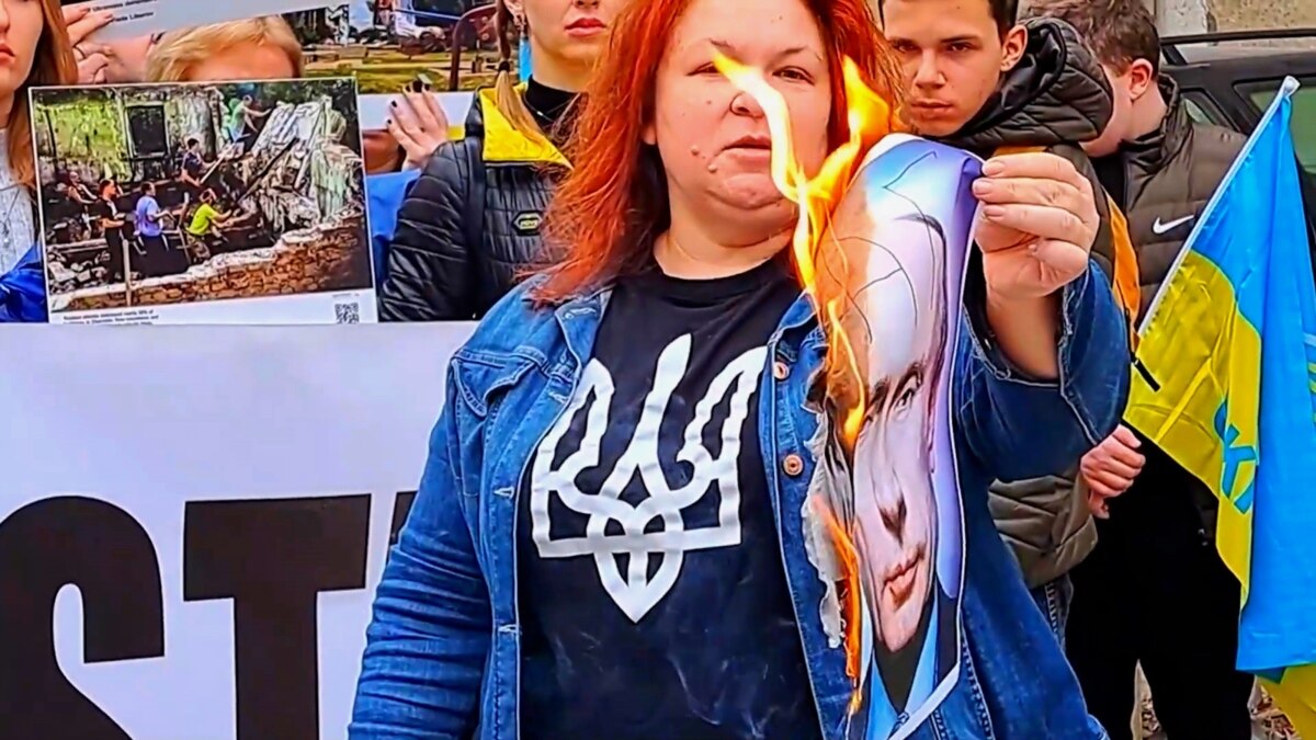 Putin's Portrait Burned Outside Russian Embassy In North Macedonia