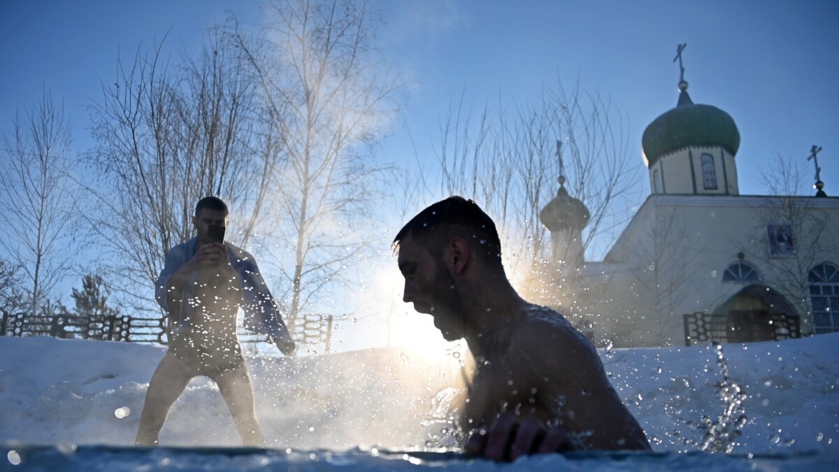 From Minsk To Vladivostok, People Plunge Into Icy Waters To Mark ...