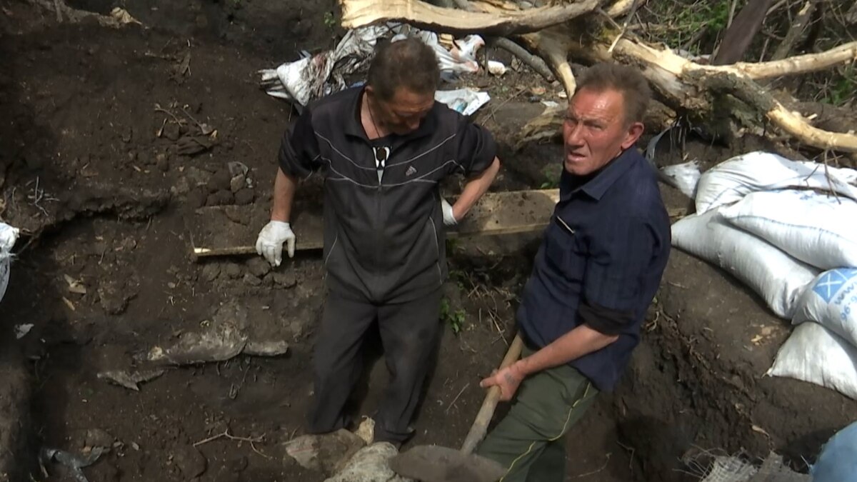 Digging Up Bodies In Ukraine In Search Of War Crimes Evidence