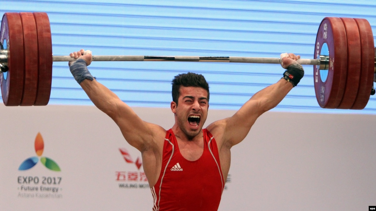 Iranian Weightlifter Rostami Sets New Record, Wins First Rio Gold For Iran