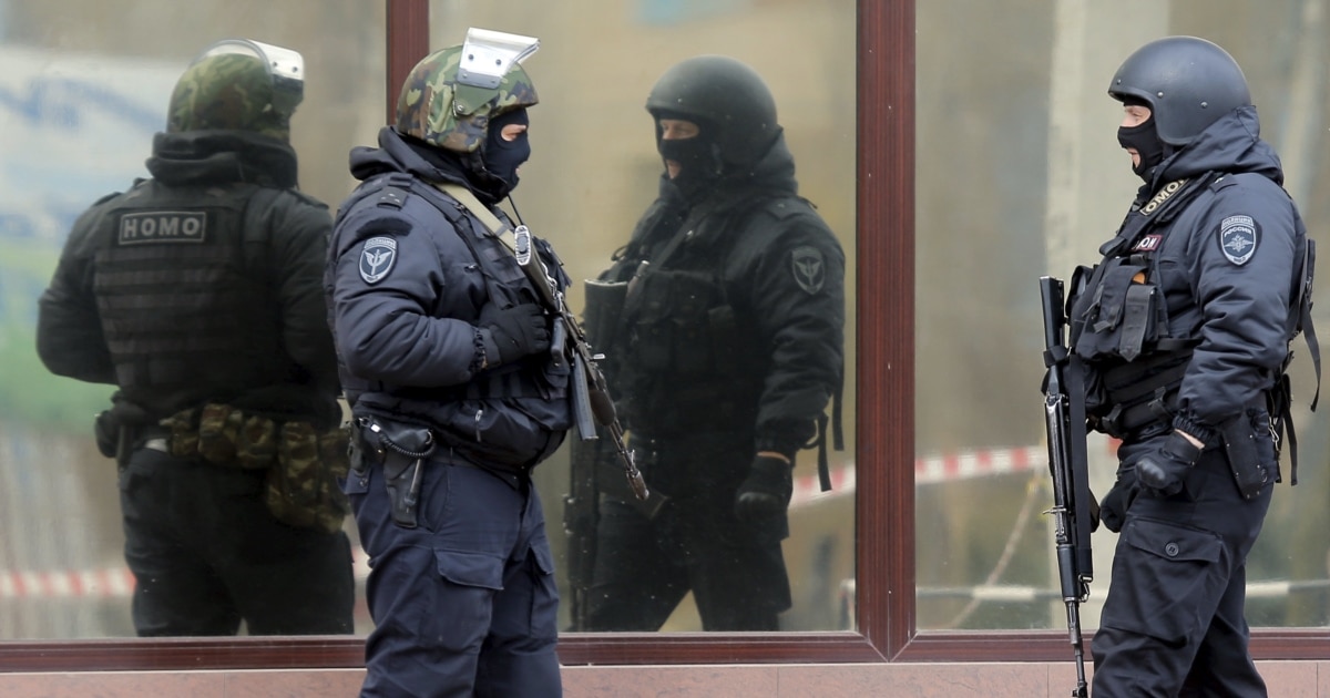 Russian Law Enforcement Officers Detain Man Suspected Of Opening Fire ...