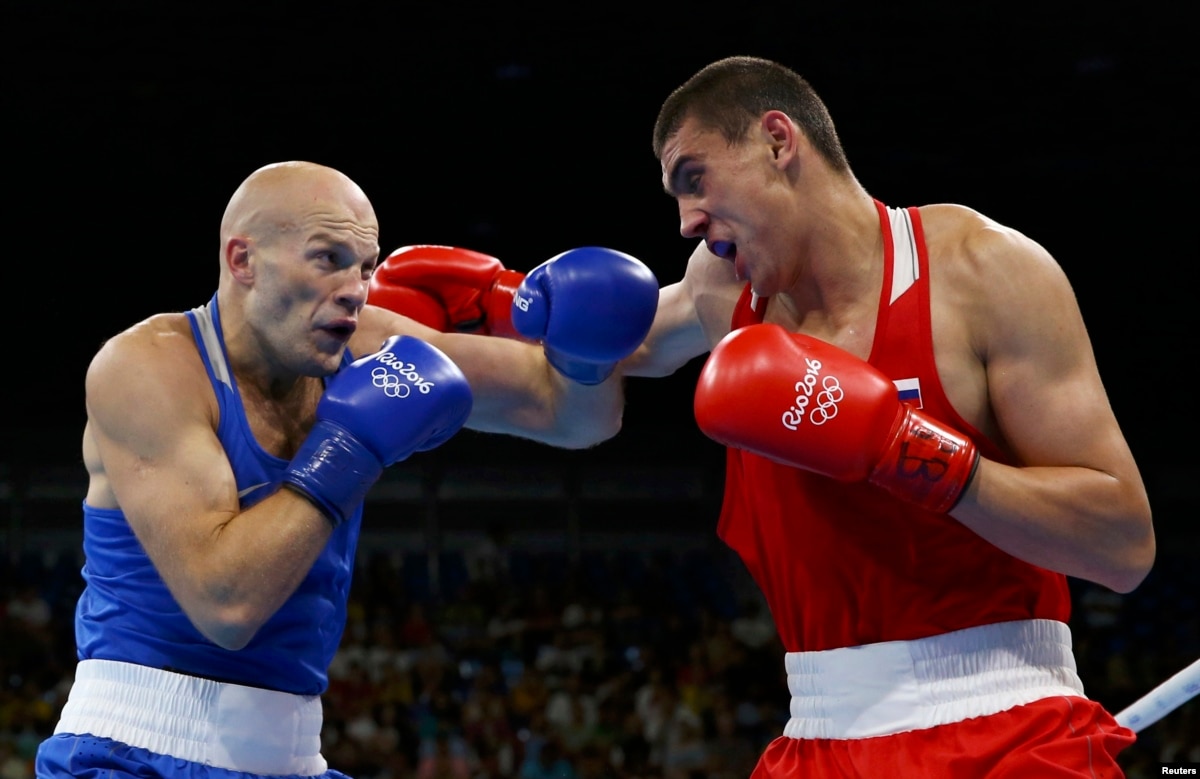 Russian Boxer Tishchenko Takes Heavyweight Gold Amid Controversy