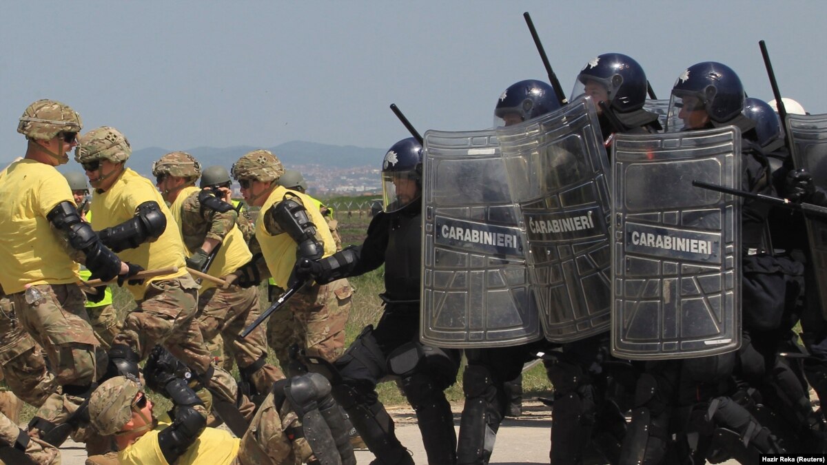 Kosovo Arrests Two Suspected Of Planning Attacks On NATO Troops, Public