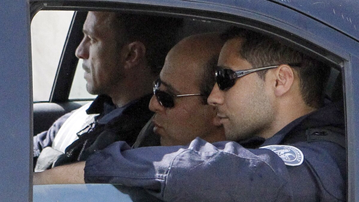 Iranian Killer Of Former Prime Minister Arrives Home From France
