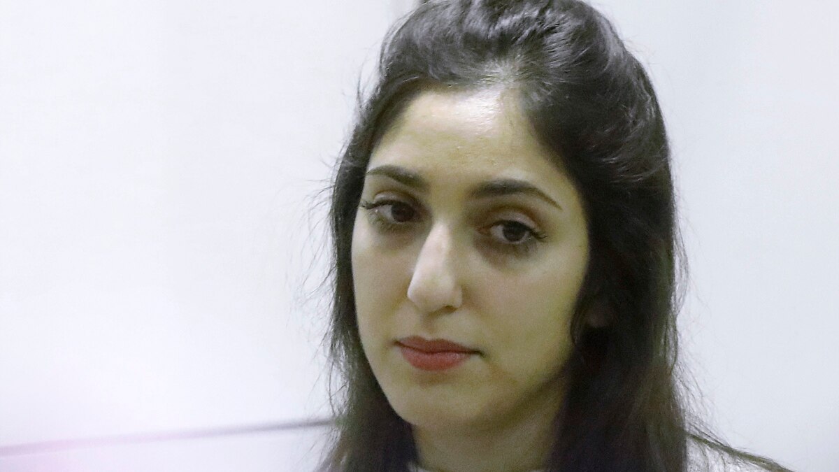 Putin Assures Mother Of Detained Traveler Her Daughter 'Will Be Okay'