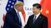 June 28, 2019 shows China's President Xi Jinping (R) shaking hands with US President Donald Trump before a bilateral meeting on the sidelines of the G20 Summit in Osaka