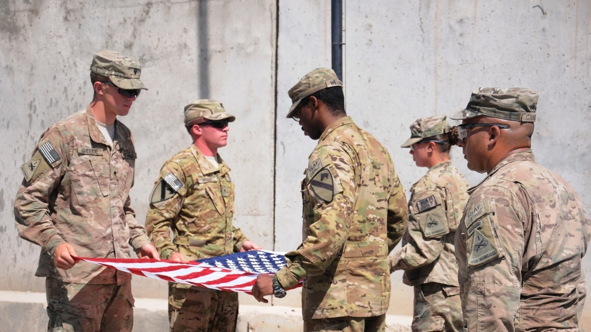 U.S., NATO Ceremonially End Afghan Combat Mission