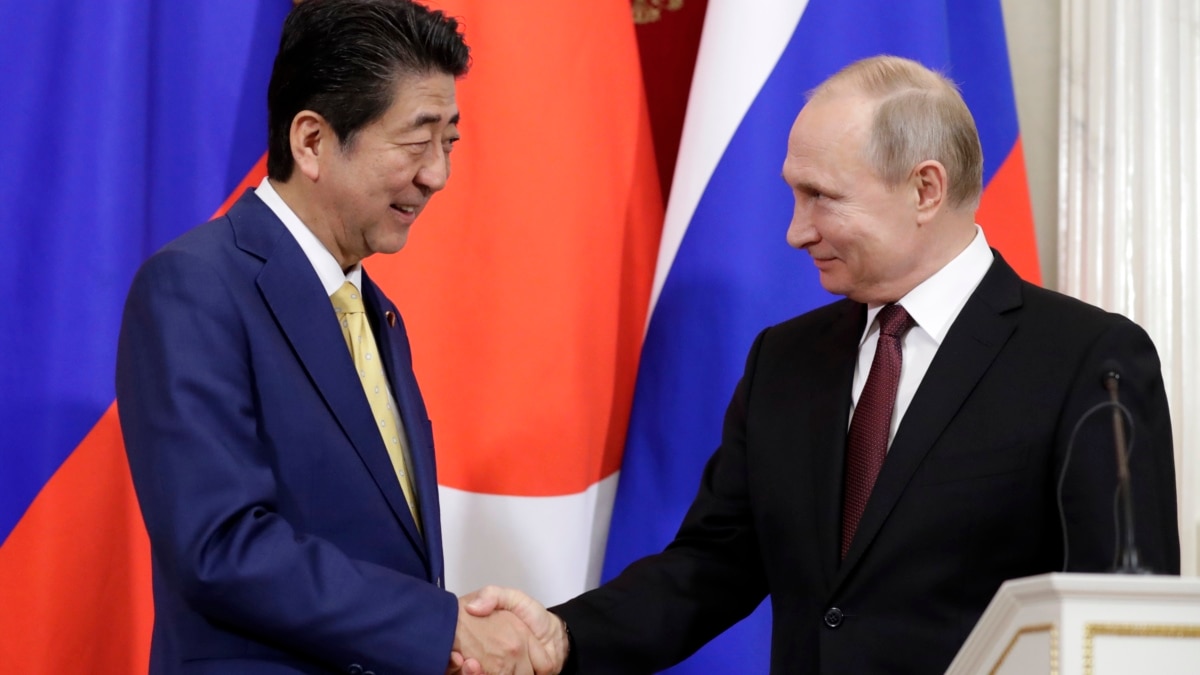 Putin Says 'Painstaking Work' Remains On Peace Deal With Japan