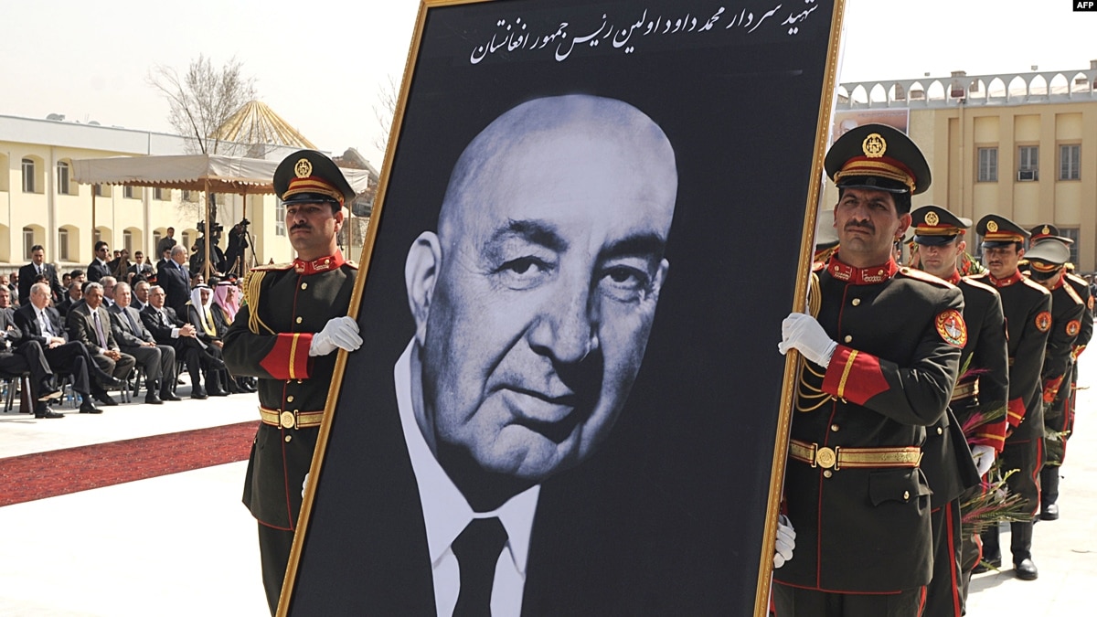 [March 2009] Army officers carrying a portrait of late Afghan President ...