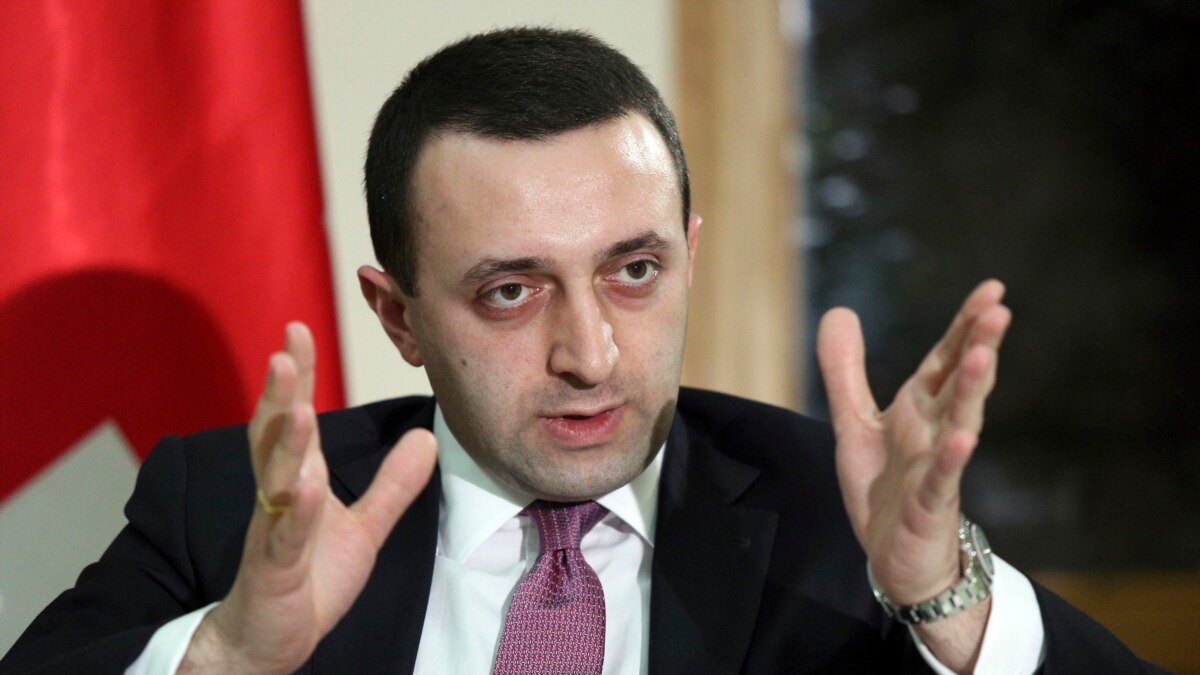 Georgian PM Hails Putin's 'Readiness To Improve Ties'