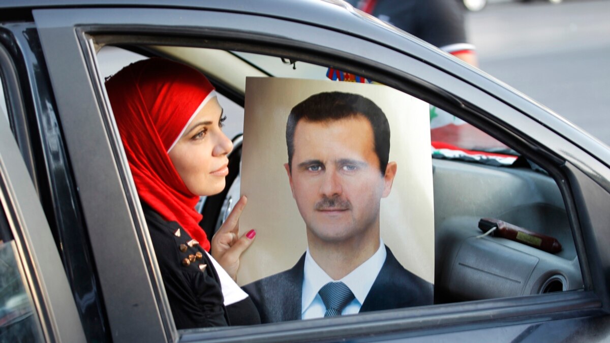 Russia Plays 'IS Threat' Card To Rehabilitate Assad's Feared 'Shabiha'