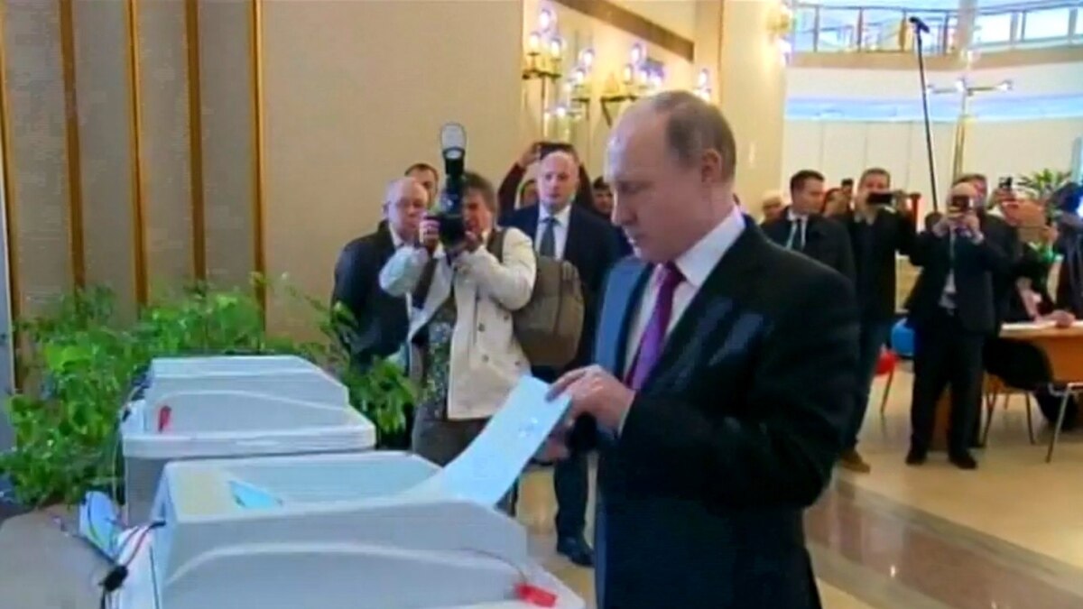 Putin Votes In Russia's Presidential Election