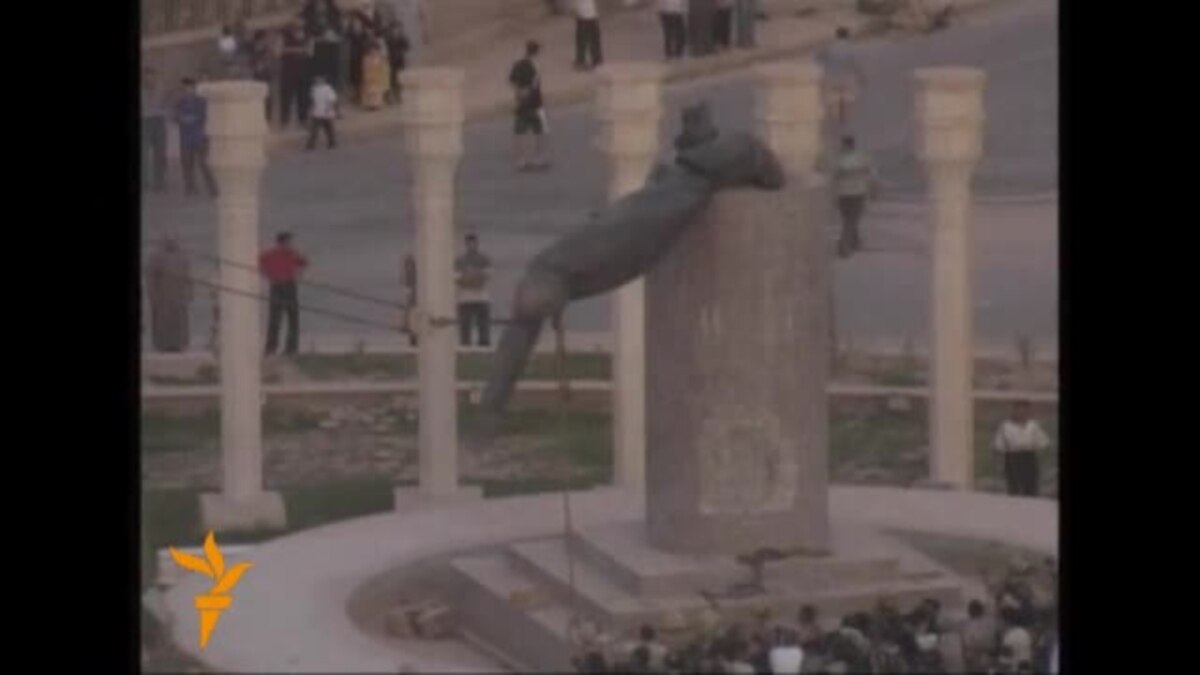 Archival Footage: Statue Of Saddam Pulled Down In Baghdad