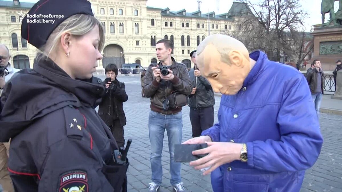 Masked Anti-Putin Protester Detained Again In Red Square