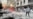 People and first-responders gather outside a building that was hit by an Israeli strike in Tehran on June 13, 2025.