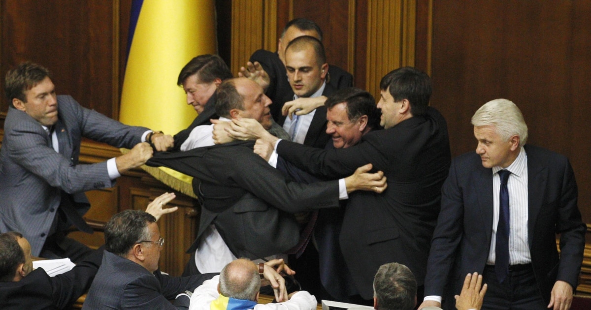 Protests, Fistfight In Parliament Over Ukrainian Draft Law On Languages