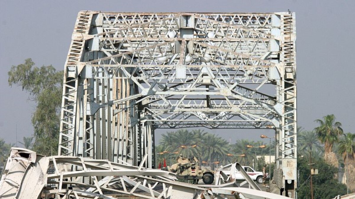 Bomb Kills At Least 10 On Baghdad Bridge